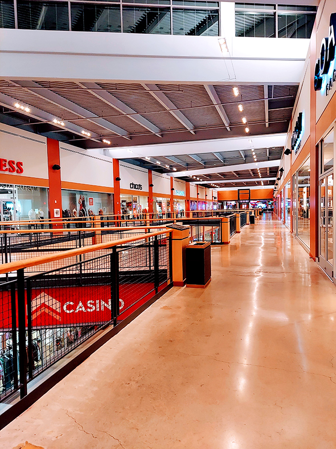 Kids Quest arcade offers salvation for shopping-weary children and partners, where axe-throwing games provide therapeutic release for those suffering from retail fatigue.