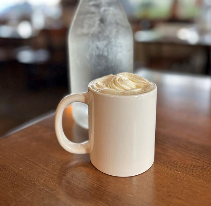 A proper cappuccino in a world of rushed coffee experiences. That foam isn't just milk—it's a pillowy cloud of dairy perfection waiting to transport you.