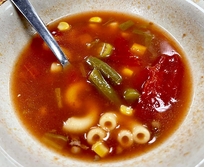 Not just any vegetable soup—a liquid quilt of comfort with every spoonful telling a different delicious story.