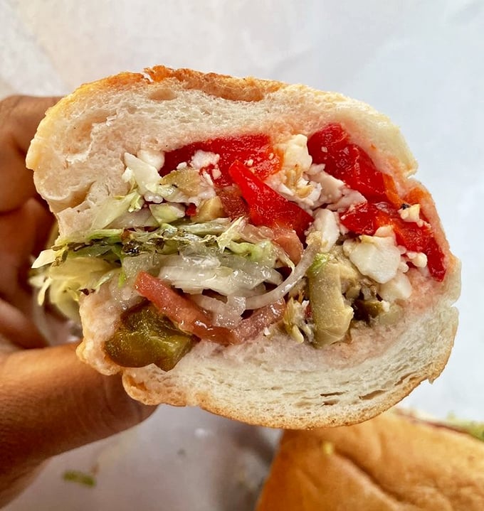 A masterclass in texture and balance&mdash;crisp vegetables nestled against soft bread with just enough dressing to unite the ingredients.