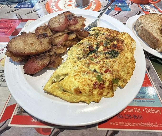 A veggie omelet so generous, it makes portion control look like a foreign concept.