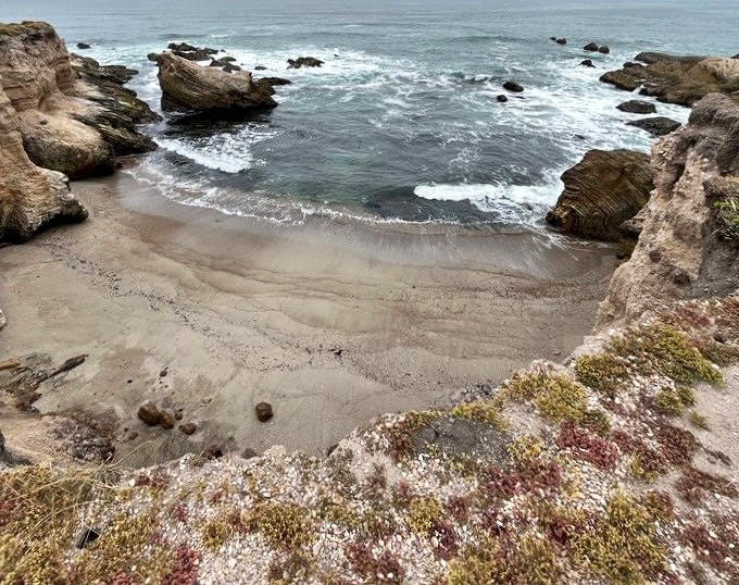 Nature's infinity pool. This secluded cove frames the Pacific in a way that makes even smartphone photos look like National Geographic covers.