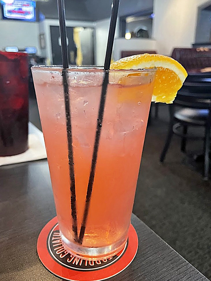 Even the cocktails dress to impress&mdash;this refreshing citrus concoction is sunshine in a glass, complete with a proper orange garnish.