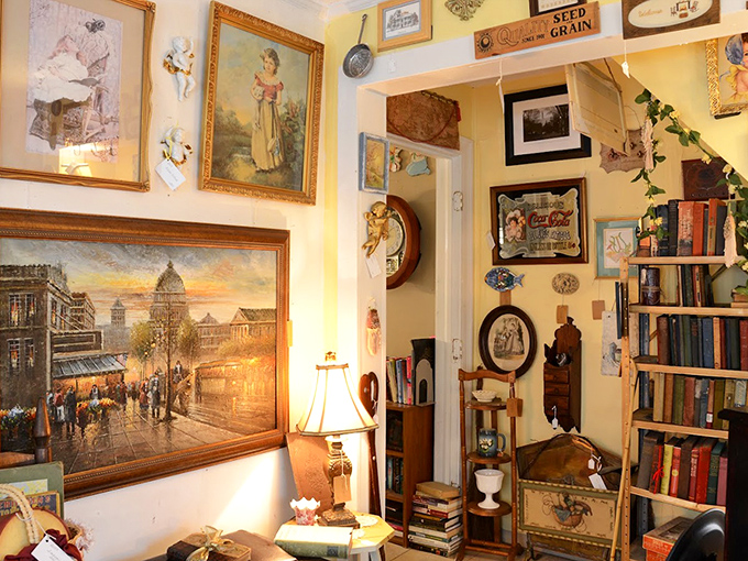Framed nostalgia adorns walls where vintage Coca-Cola signs hang alongside artwork that once graced grandmother's parlor.