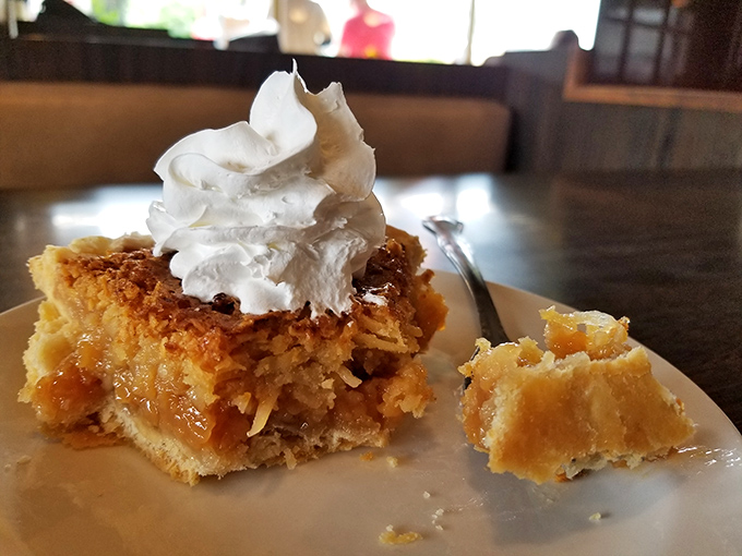 Not just dessert, but a slice of Americana&mdash;homemade walnut pie topped with a cloud of whipped cream that defies gravity.
