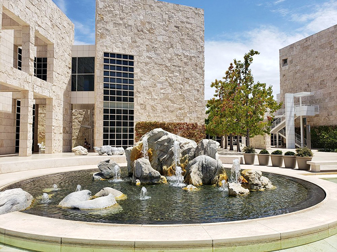 Water and stone create a meditative oasis amid travertine pavilions &ndash; nature's coolest collaboration since peanut butter met jelly.