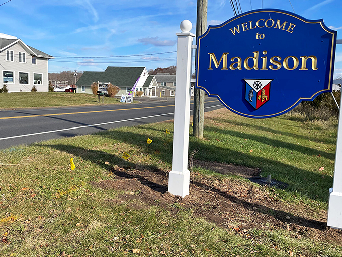 The welcome sign says "Madison" but really means "slow down, relax, and prepare to fall in love with a town that time politely decided to respect."