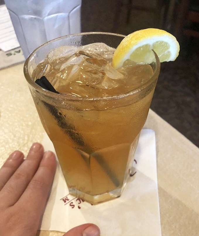 Sweet tea with lemon—Georgia's unofficial state beverage, served in a glass large enough to baptize a small child.