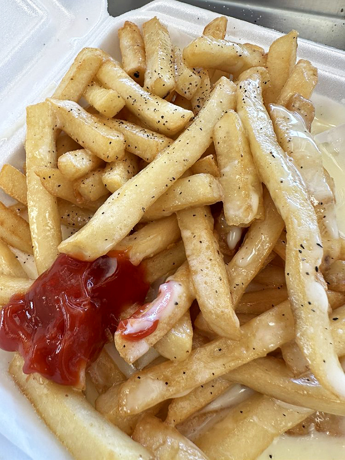 These aren't just fries; they're vehicles for cheese and ketchup, crispy on the outside, fluffy within&mdash;the perfect cheesesteak sidekick.