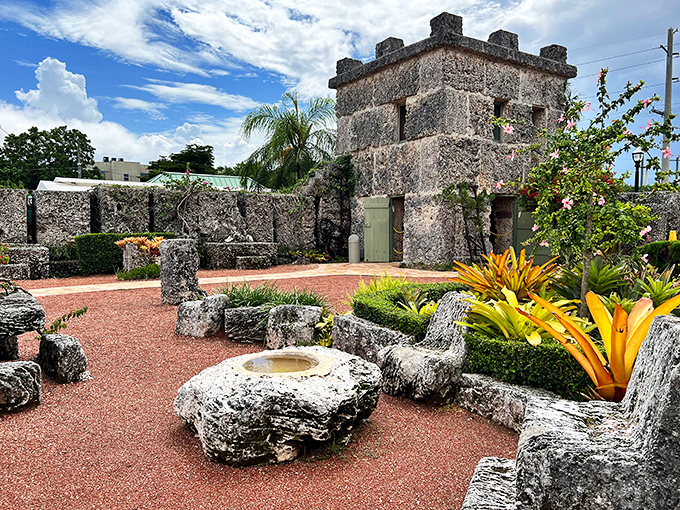 Megalithic structures frame lush greenery in this surreal landscape that feels part ancient temple, part eccentric's backyard masterpiece.