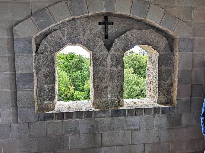 Gothic-inspired windows frame the verdant Florida landscape, creating perfect portals between ancient architectural traditions and tropical reality.