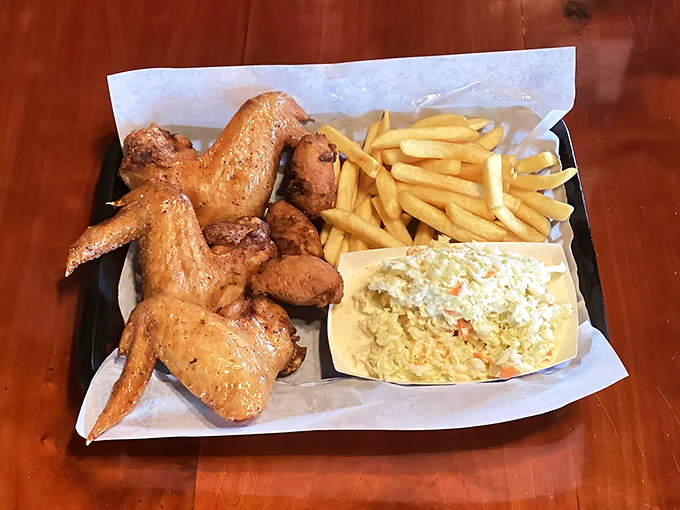 Wings that don't need a sporting event excuse, served with fries and slaw&mdash;a plate that says "today is special enough."