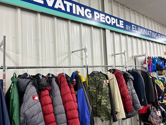 "Elevating People by Eliminating Barriers" &ndash; the mission statement hangs proudly above winter coats waiting for their second chance.
