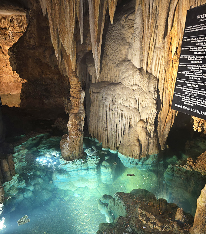 The Wishing Well glows with an otherworldly blue light. Coins tossed by hopeful visitors rest atop formations older than human civilization.