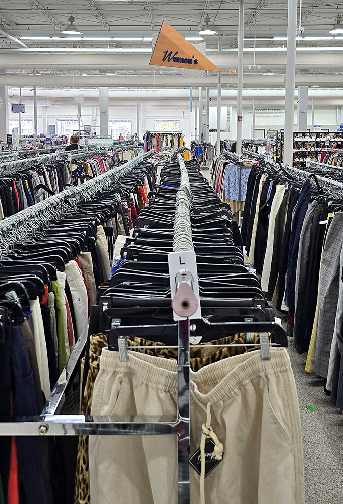 The women's section stretches toward the horizon like a fashion runway for the budget-conscious. Size L has never looked so promising.