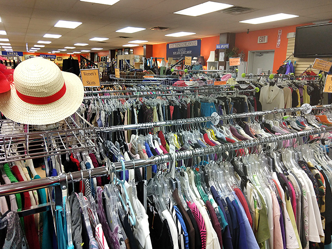 Racks upon racks of clothing stretch toward the horizon, a textile landscape where patience rewards the persistent shopper.