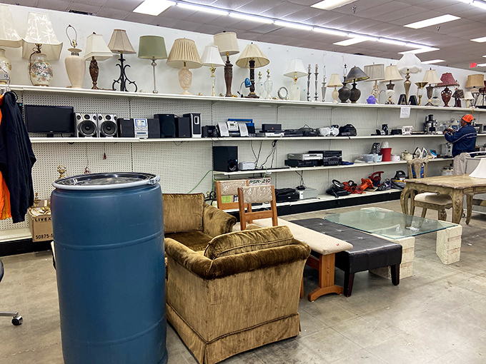 The furniture and electronics section: where yesterday's living room centerpieces await their second act. That blue barrel? Pure mystery bonus.