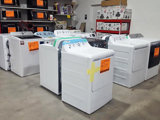 The appliance section showcases washing machines and dryers that somehow found their way from department store showrooms to discount paradise.