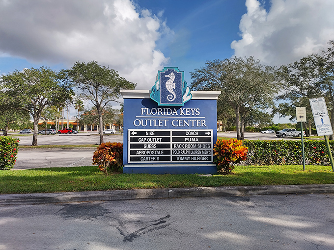 The marketplace sign serves as your treasure map to retail nirvana, with brand names that would normally send your credit card into therapy.