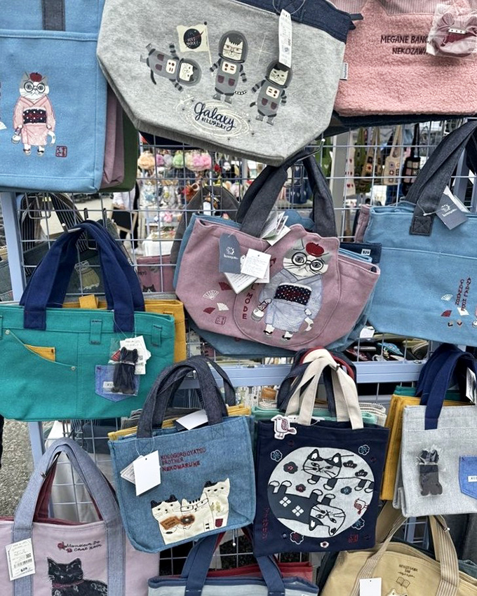 Cat lovers, rejoice! These whimsical totes featuring feline friends prove that crazy cat lady isn't an insult—it's a fashion statement worth carrying proudly.