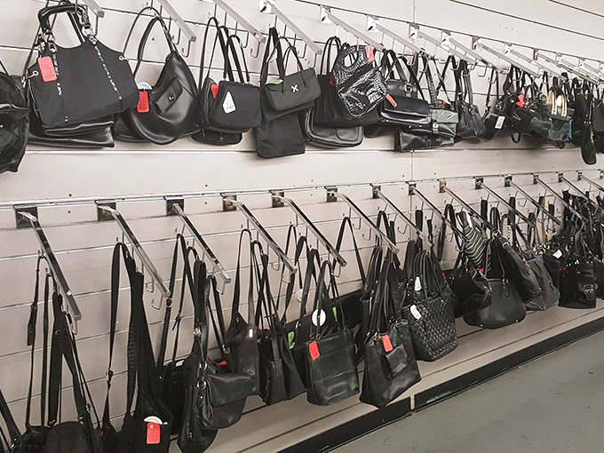The handbag wall&mdash;where yesterday's fashion statements await their second act in tomorrow's ensembles.