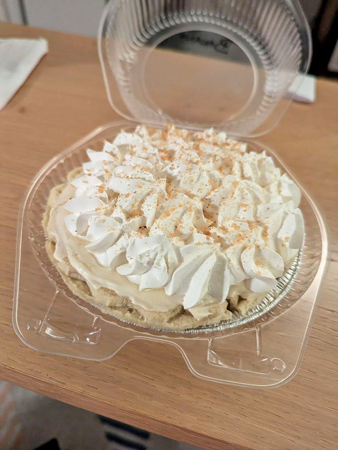 Cream piled high like clouds on a summer day. This banana cream pie isn't just dessert&mdash;it's a mood-altering experience with a crust.