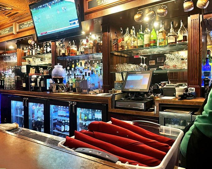 A bar stocked for serious business &ndash; where Old Fashioneds are crafted with reverence and bartenders remember your name.