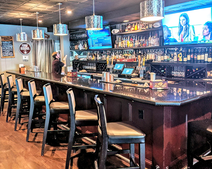 Not just a bar, but a community gathering spot where bottles stand like soldiers ready for duty and conversations flow as smoothly as the drinks.