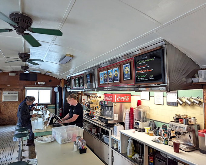 The heart of diner operations&mdash;where coffee flows like conversation and the soda fountain stands ready to fulfill childhood nostalgia with adult permission.