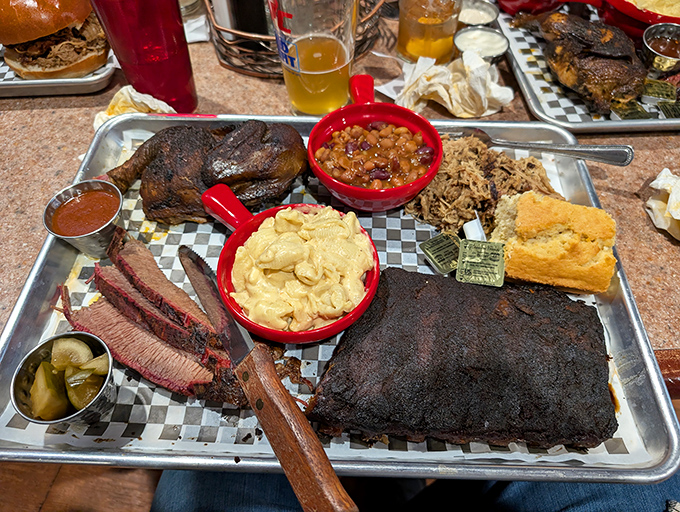 Not so much a platter as a barbecue greatest hits album. The pickles aren't just garnish—they're the palate-cleansing intermission between meat movements.