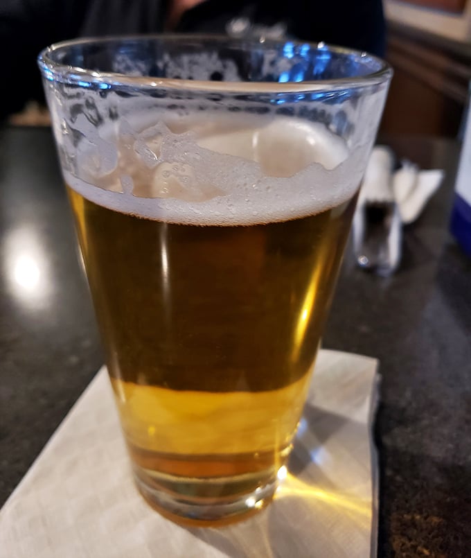 A perfectly poured beer awaits its destiny &ndash; to wash down whatever delicious creation you've ordered. Simple pleasures are often the most satisfying.