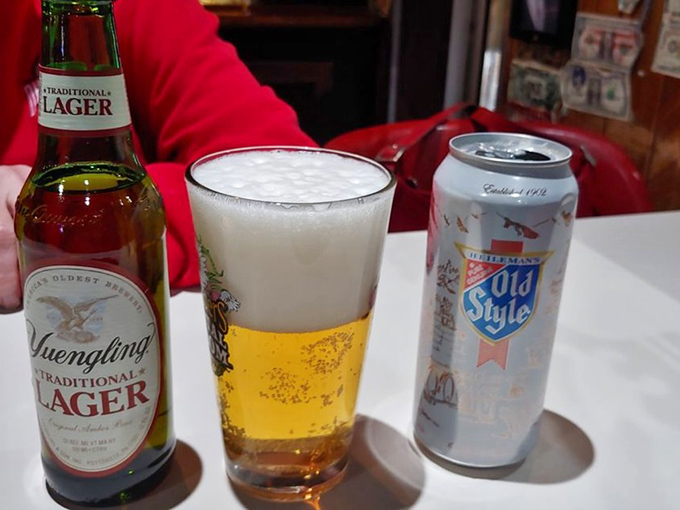 Cold beer and good company &ndash; the universal language of neighborhood taverns everywhere. Yuengling and Old Style standing by for pizza duty.
