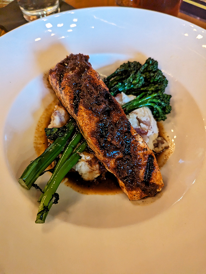 The Beer Molasses Salmon proves fish can be both sophisticated and comforting—like your favorite professor who also knows all the best dad jokes.