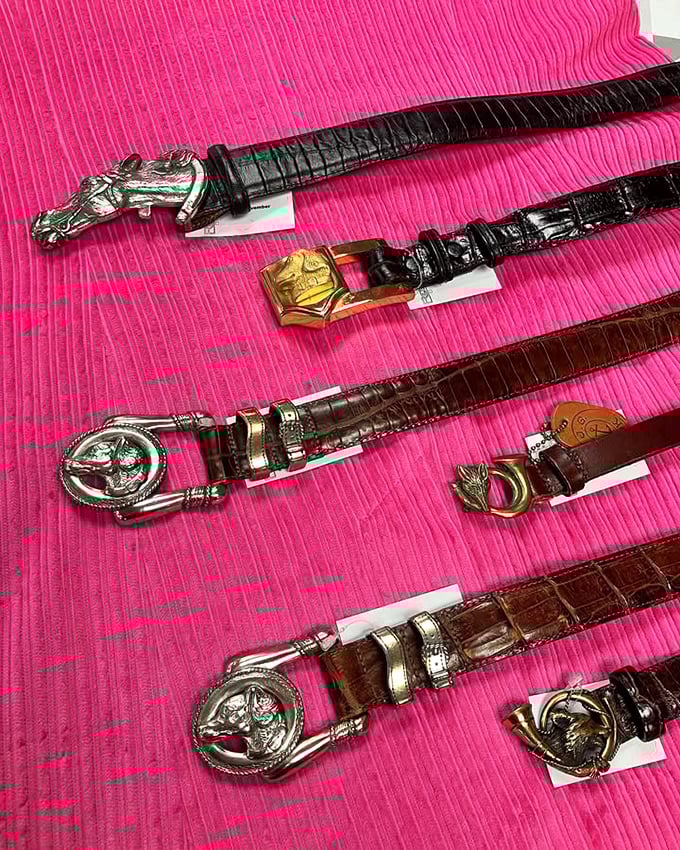 These aren't just belts—they're wearable sculptures with horse heads and ornate buckles that turn basic outfits into conversation starters.