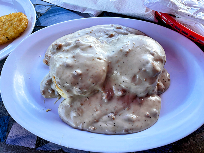 Biscuits and gravy so rich they should have their own tax bracket. Southern comfort food that hugs your insides.