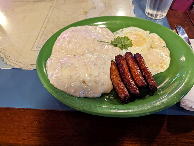 Biscuits and gravy &ndash; the breakfast that hugs you from the inside out, with sausage links standing at attention like delicious sentinels.