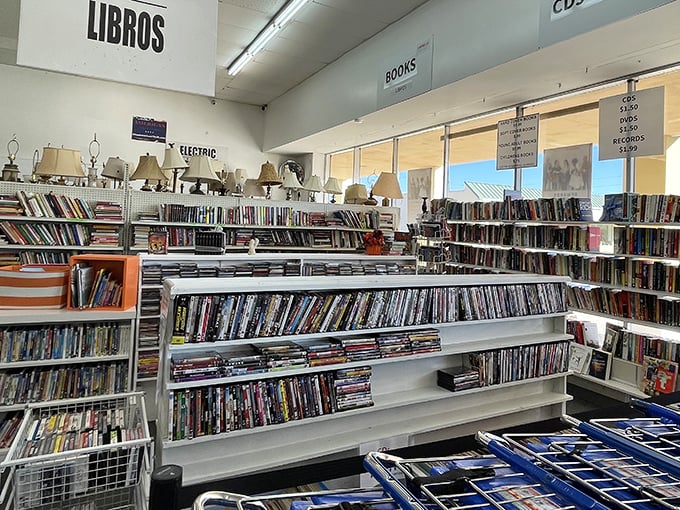 The literary corner&mdash;where paperbacks and DVDs wait for their sequel: life in your home. "Libros" for everyone, proving good stories transcend language.