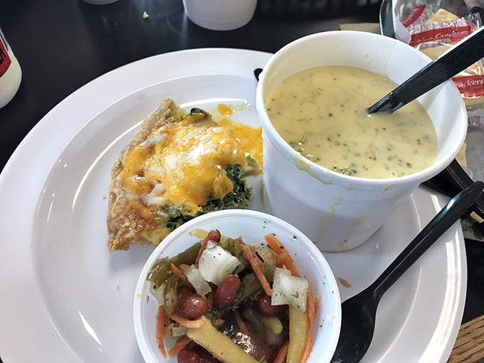 A perfect lunch trifecta&mdash;quiche, soup, and bean salad. This plate doesn't just feed your body; it nourishes your belief that simple food done right is culinary genius.