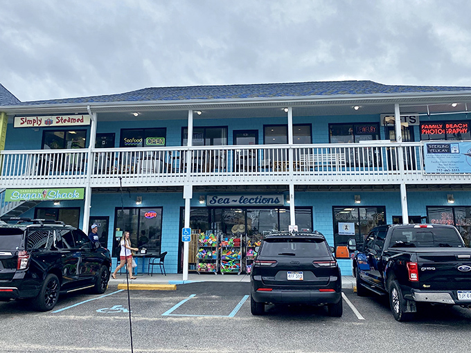 The unofficial downtown of Sandbridge: a two-story collection of shops where flip-flops are formal wear and sunscreen is considered makeup.