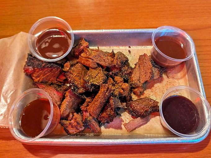 Burnt ends &ndash; those caramelized, flavor-packed morsels of brisket heaven surrounded by a quartet of sauces for dipping adventures.