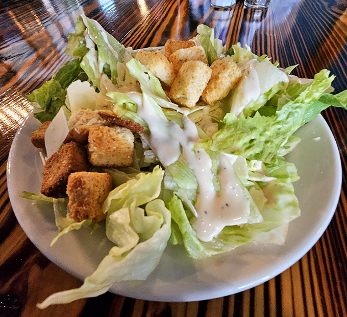 A proper Caesar salad is simple but never boring—crisp romaine, house-made croutons, and just enough dressing to coat each leaf without drowning it.