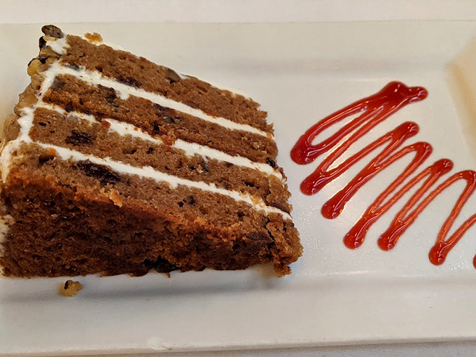 Layer upon layer of moist carrot cake that somehow makes you believe vegetables were invented for dessert all along.