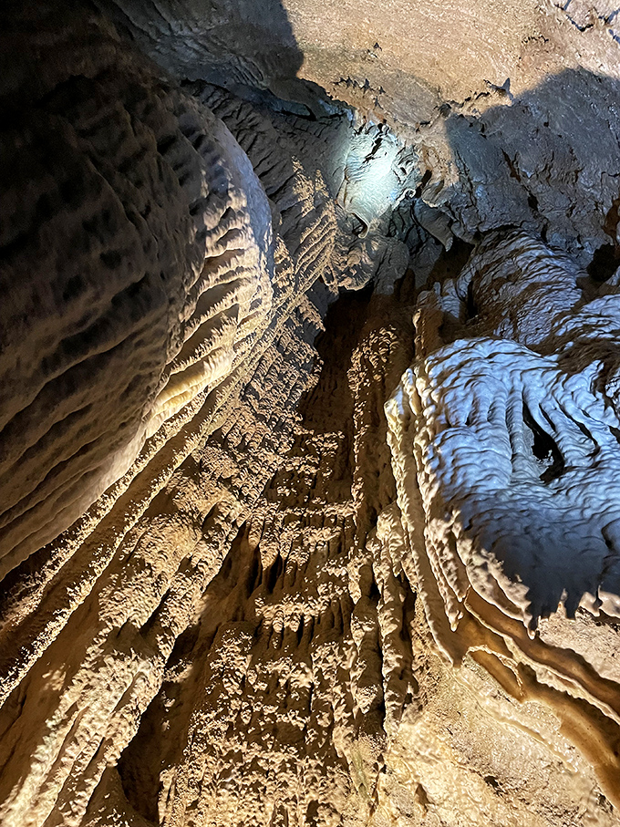 Looking up at cathedral-like ceilings that would make Michelangelo jealous. Nature's been sculpting this masterpiece one water droplet at a time.