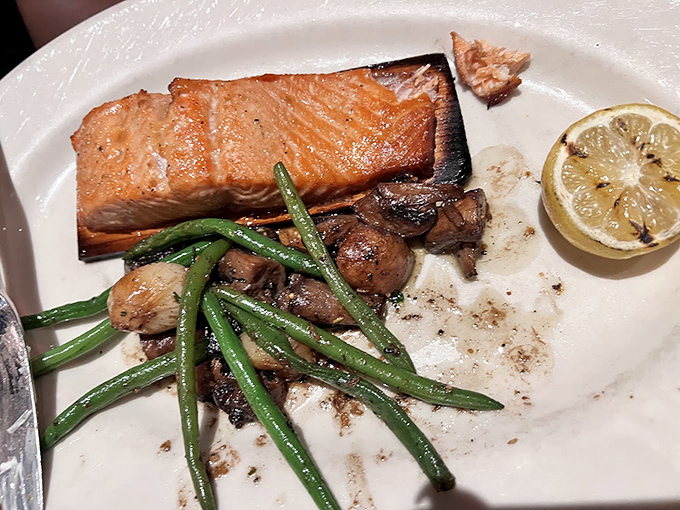 Cedar-planked salmon that's absorbed just enough smokiness to make you wonder if fish have been missing their true calling all along.