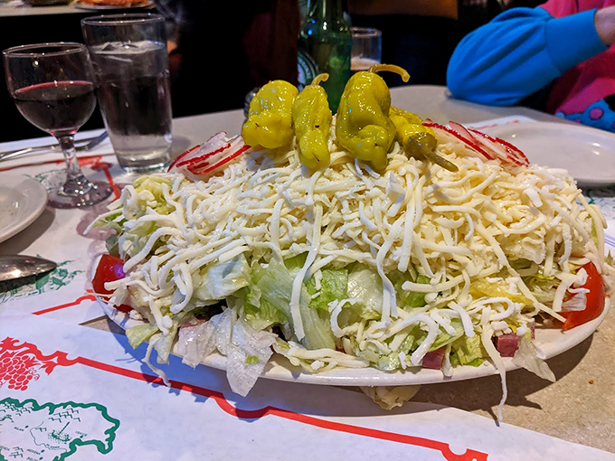 The salad that launched a thousand cravings&mdash;a mountain of cheese atop crisp lettuce with those signature banana peppers standing guard like yellow sentinels.