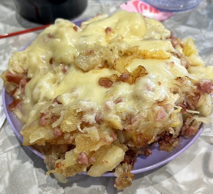 Potatoes and cheese having their best day ever. This Pittsburgh hash isn't just a side dish&mdash;it's the main event disguised as a supporting actor.