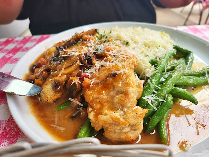 That Marsala sauce pooling around tender chicken makes you understand why people write sonnets about food.