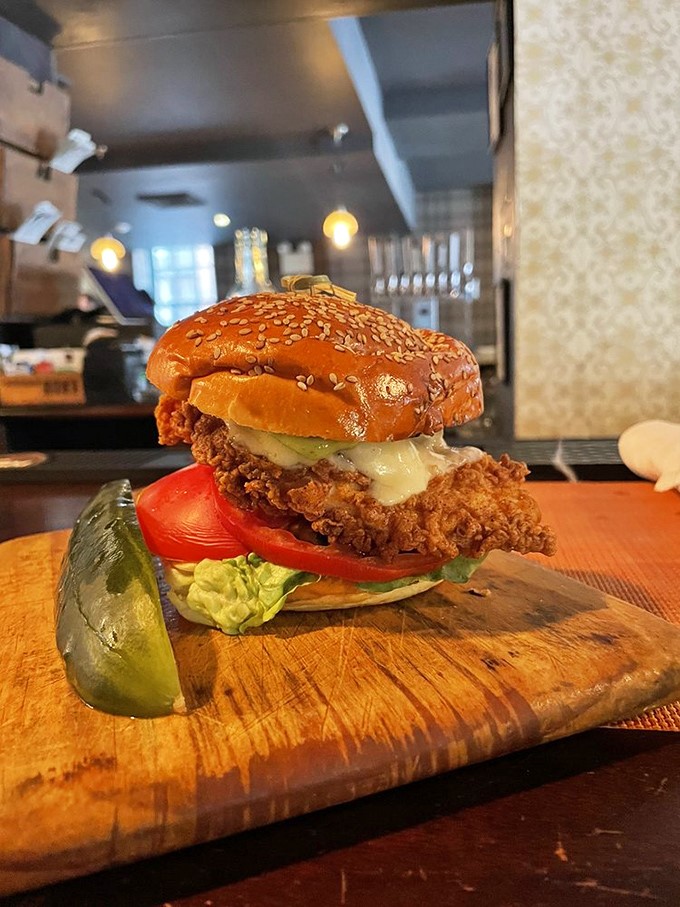 This isn't just a chicken sandwich—it's a towering masterpiece of crispy, juicy perfection that makes fast food versions weep with inadequacy.