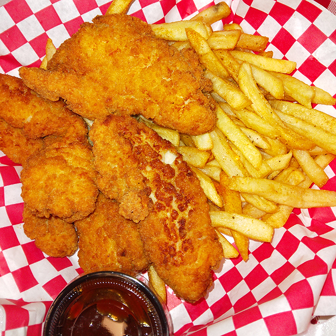 Chicken tenders that actually deserve the name "tender." Crispy, juicy, and substantial enough to make you forget they're technically a kid's menu staple.