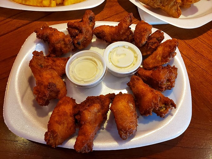 Wings arranged in a perfect circle, like a delicious clock counting down the minutes until your next visit.